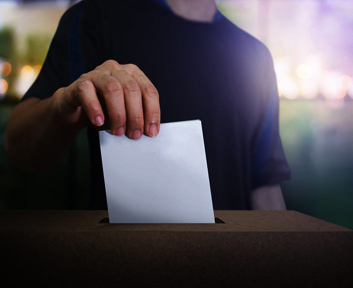 Hand Holding Ballot Paper For Election Vote At Place Election Ba ...